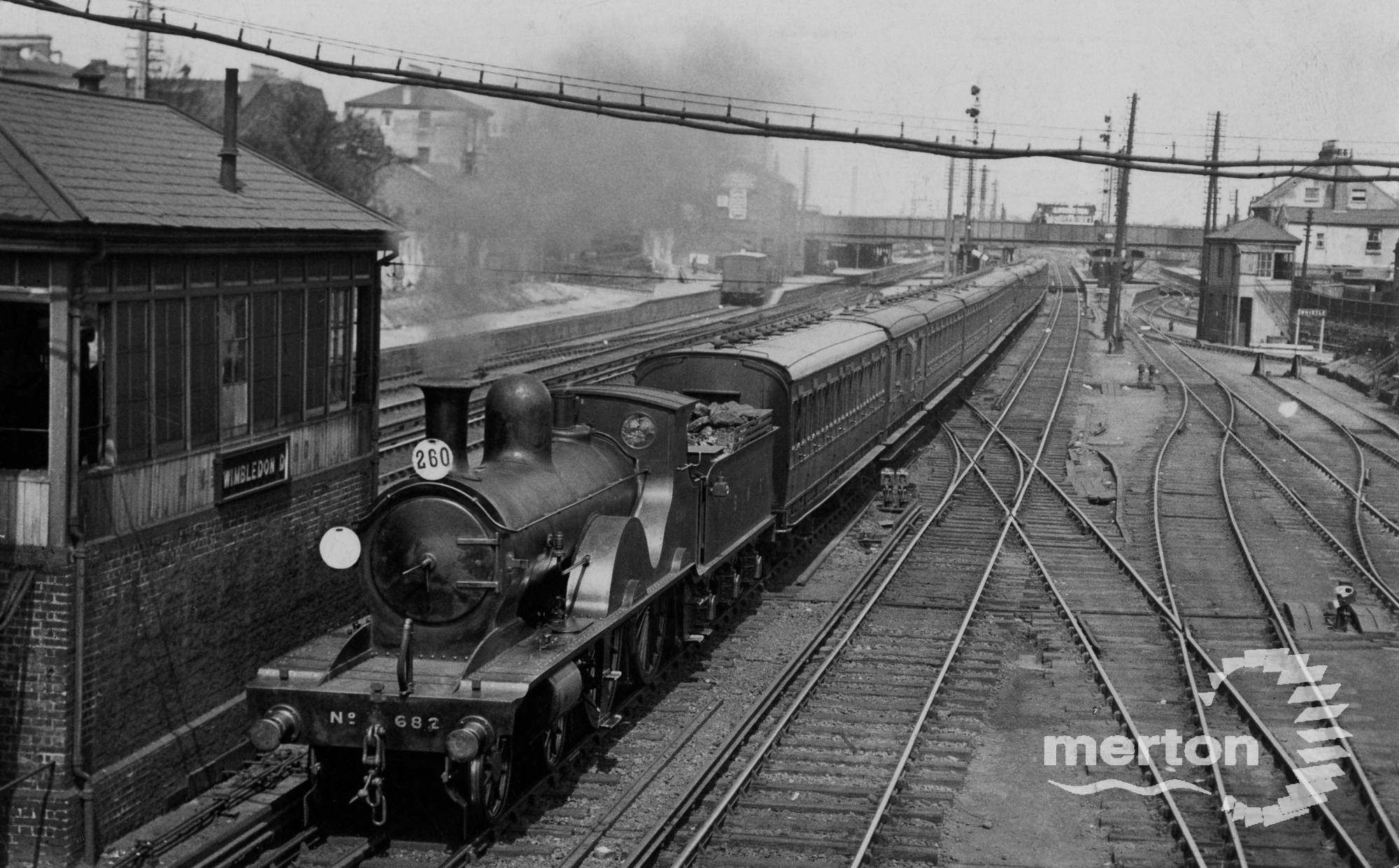 Train passing the Wimbledon 'D' signalbox, Wimbledon Station - Merton ...