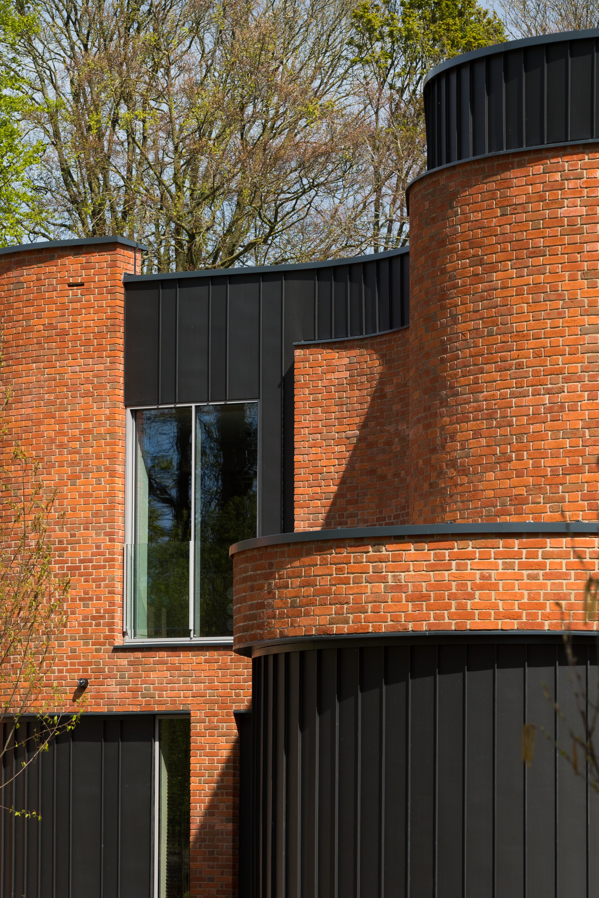 Adrian James completes curved brick home