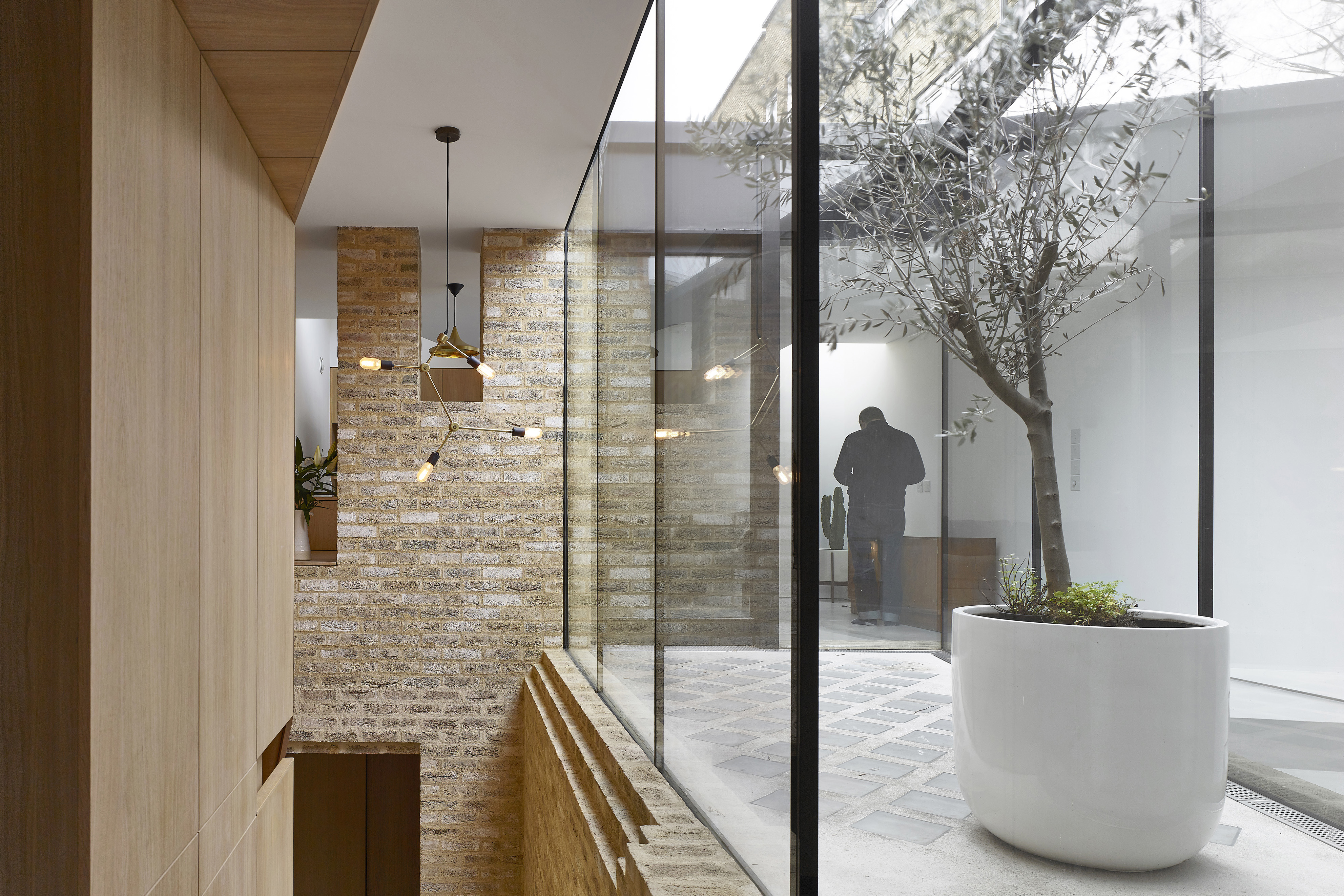 Hayhurst and Co completes light-filled windowless house on backland site