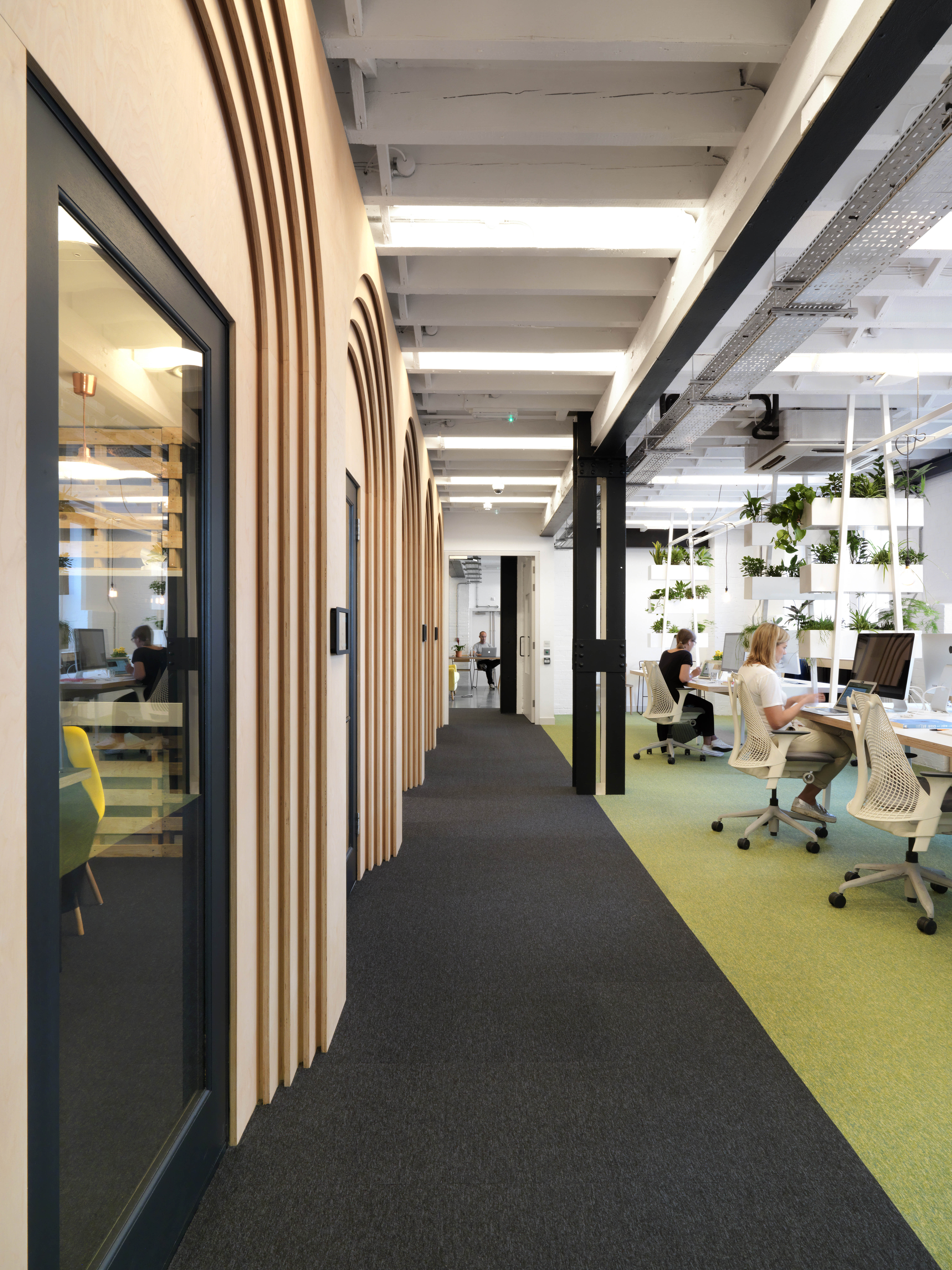 Airbnb’s office annexe by Threefold Architects references a winter garden