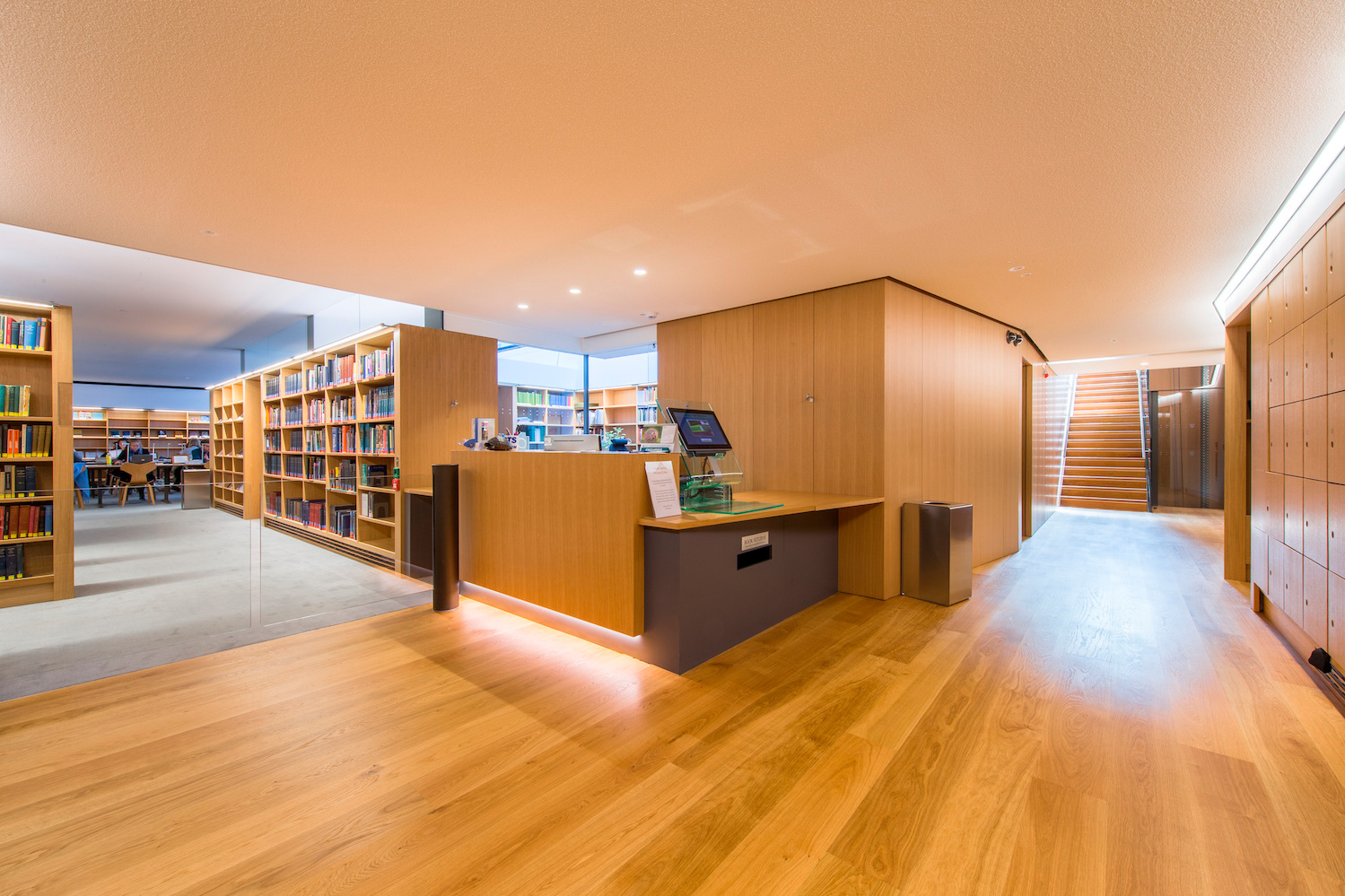 MICA Architects completes underground library at The Queen’s College ...