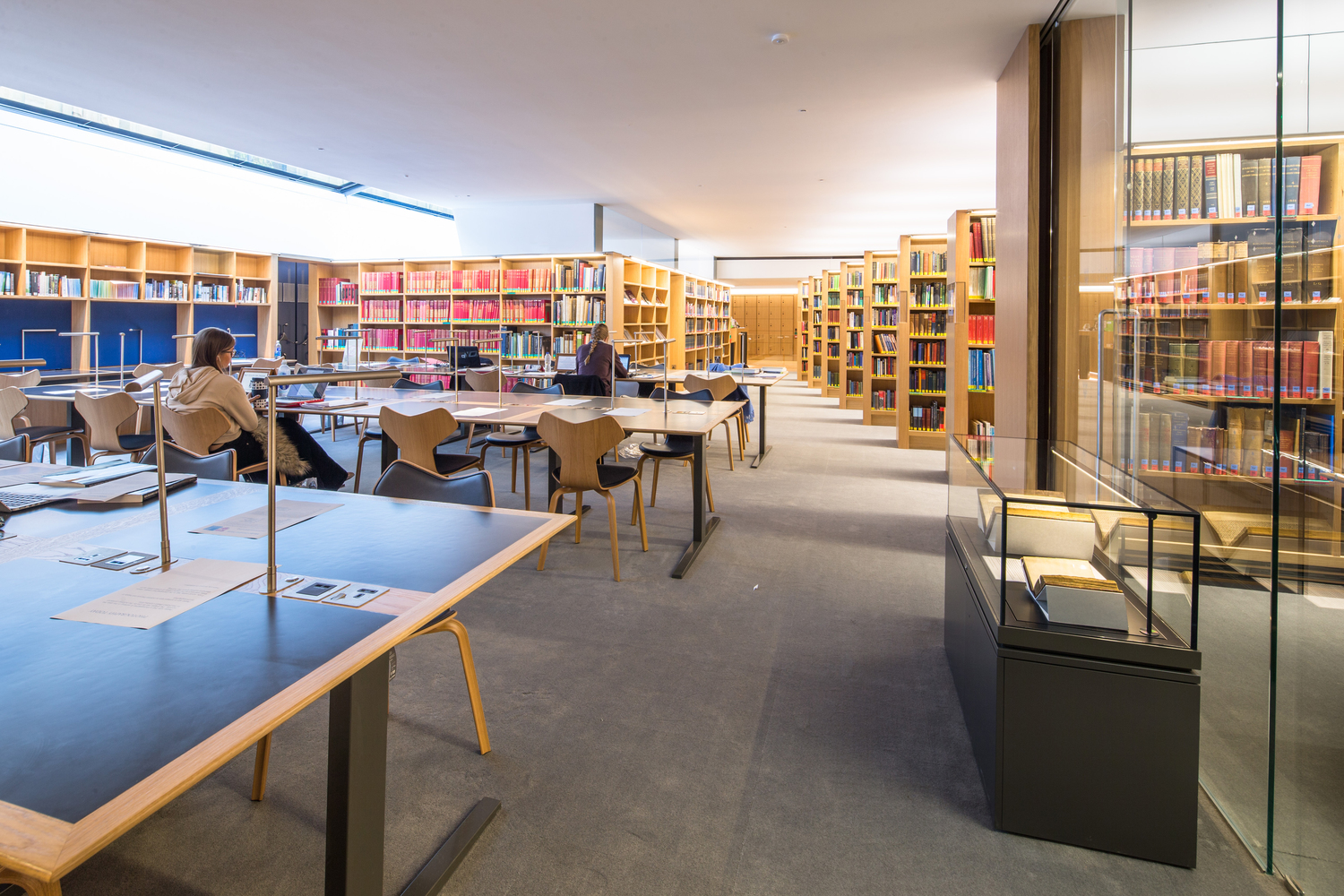 MICA Architects completes underground library at The Queen’s College ...