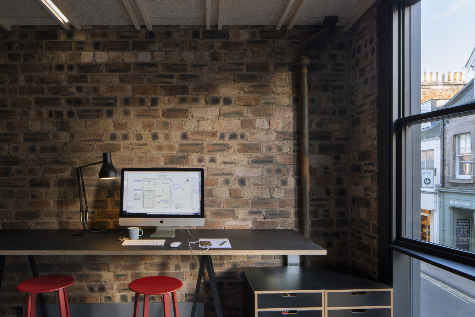 Scottish practice Sutherland & Co designs its own studio for £60k