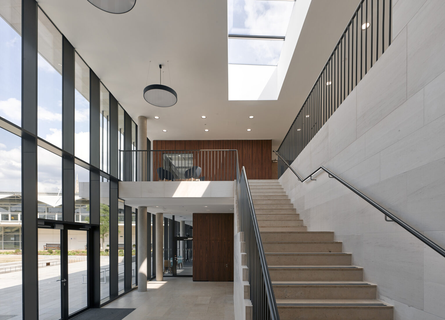 John McAslan + Partners completes academic hub and sports pavilion at ...