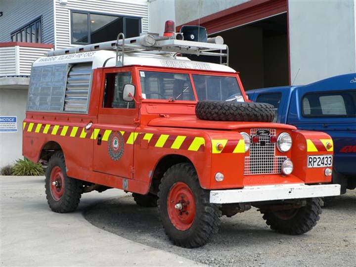 Fire Engines Photos - 1958 Land Rover Fire Engine by Carmichael