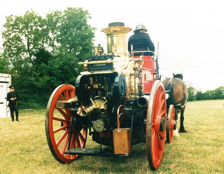Fire Engines Photos - horse-drawn steam fire engine rear