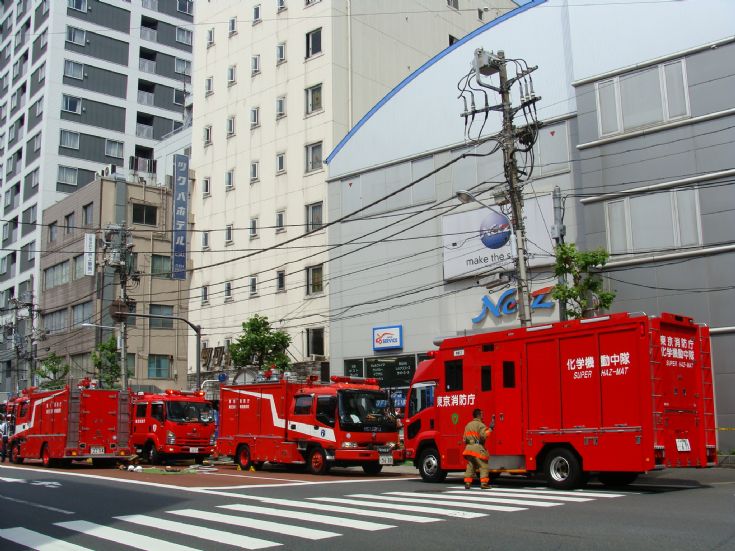 Fire Engines Photos - Severalo Fire units in action Tokyo Japan