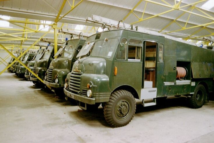 Fire Engines Photos - Picture of Green Goddesses in storage