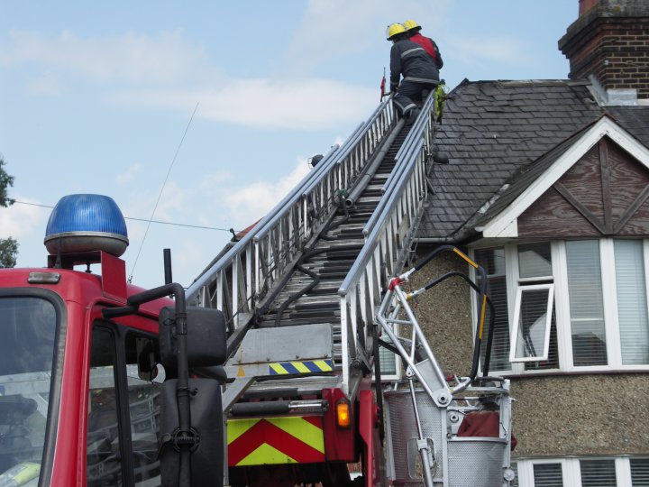 Fire Engines Photos - Image of Suffolk fire fighters at work at a fire