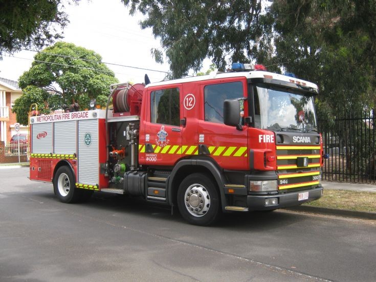 Fire Engines Photos - Melbourne MFB pump 12 in suburban Preston.