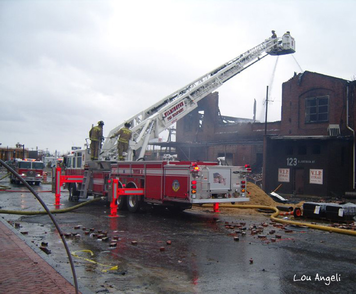 Fire Engines Photos - Aerial appliance in action
