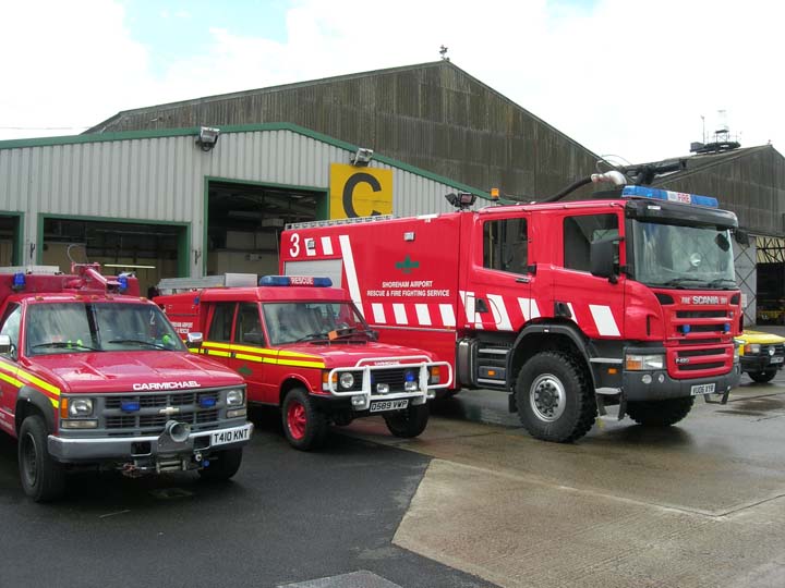 Fire Engines Photos - Line up Fire brigade Airport Brighton City