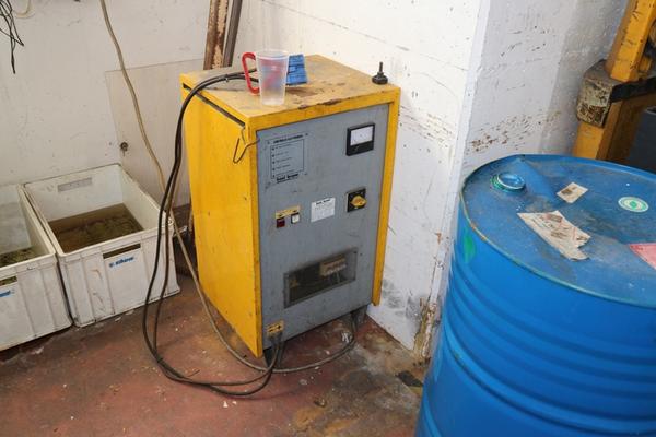 Lot Robustus forklift and Bassi Group battery charger