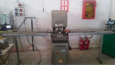 Lot F.lli Rinaldi drilling machine with roller conveyor