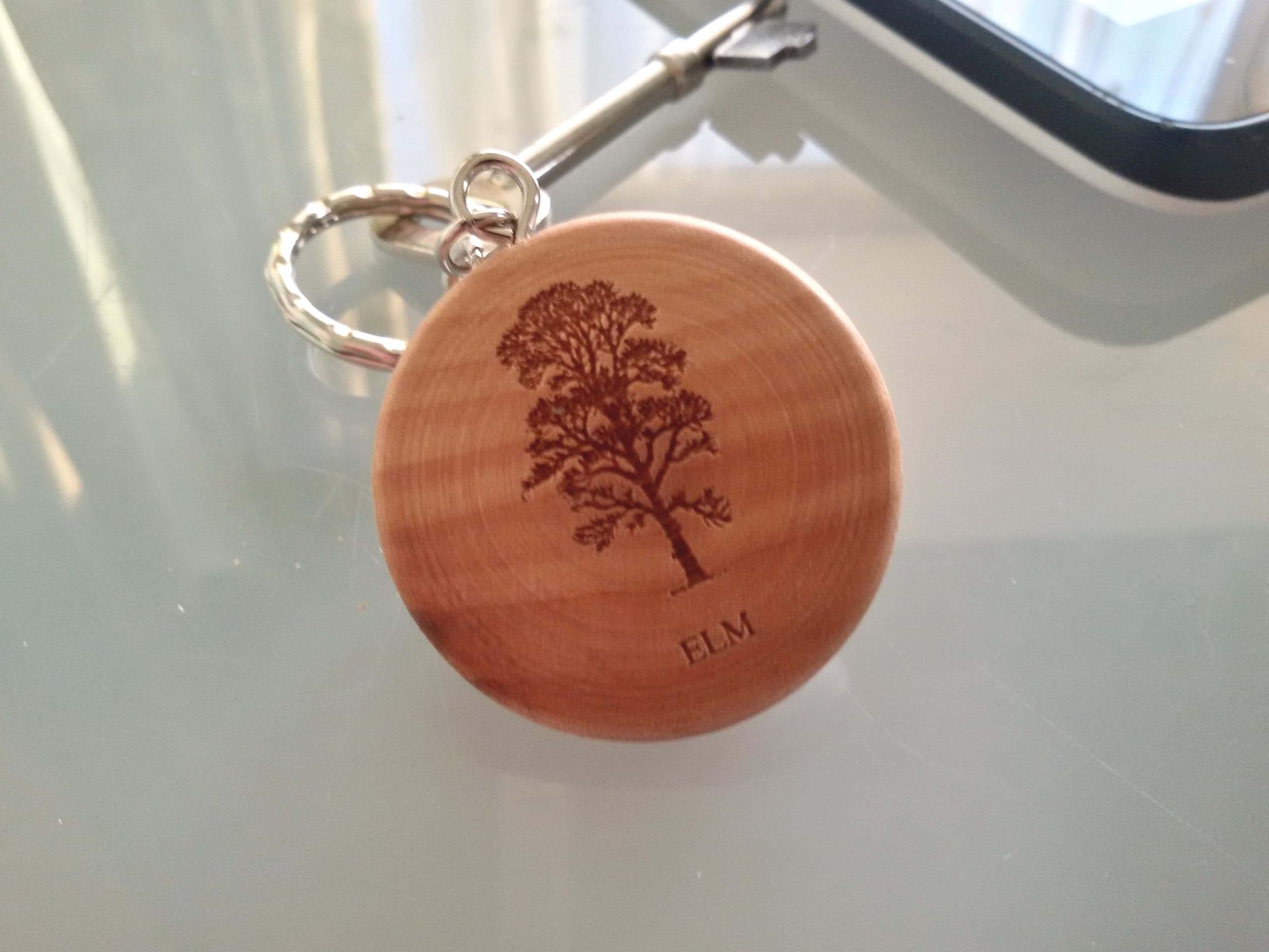 Round wooden keyring engraved with your favourite tree