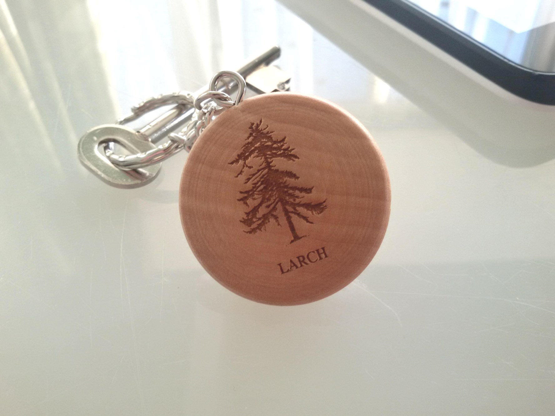 Round wooden keyring engraved with your favourite tree