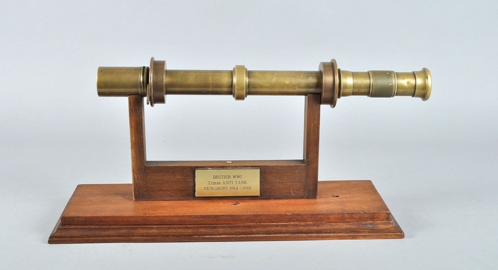 A British World War I 22mm. anti tank gun sight 1914/1918, with wooden ...