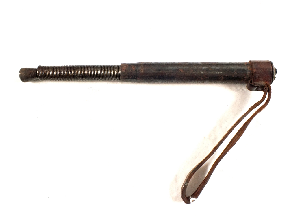 A WWI trench fighting extendable cosh with centre spring