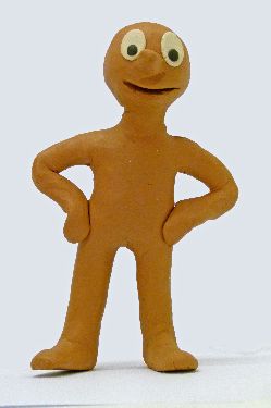 Peter Lord - Aardman Animation - Modelling clay figure of Morph, in a ...