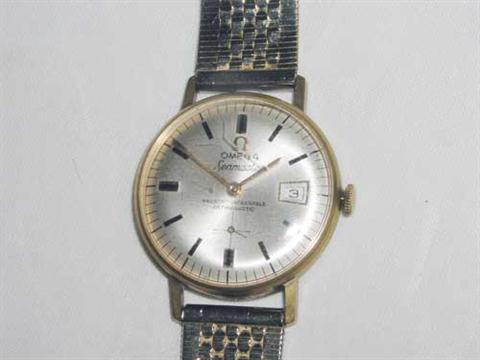 A gentleman`s 18 ct Gold Omega - Seamaster Wristwatch Ressort ...