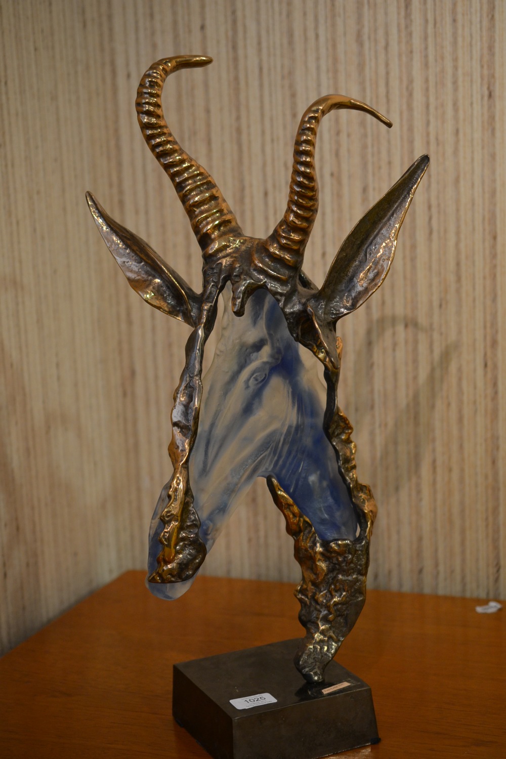 Yves Lohe (French, b.1947): A Bronze and Glass Sculpture, modelled as a ...