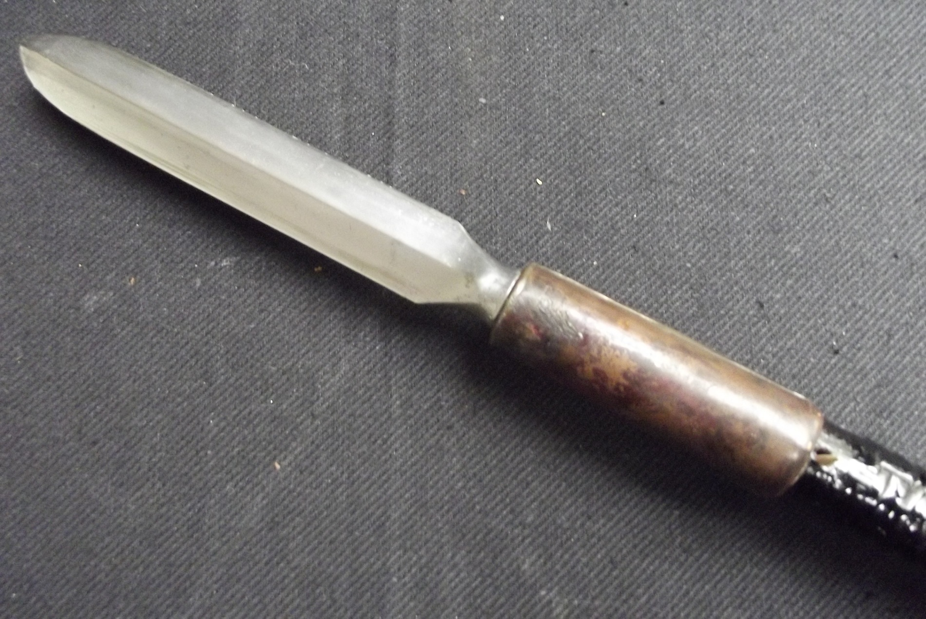 A 19th century Japanese yari spear with a diamond section double edged ...