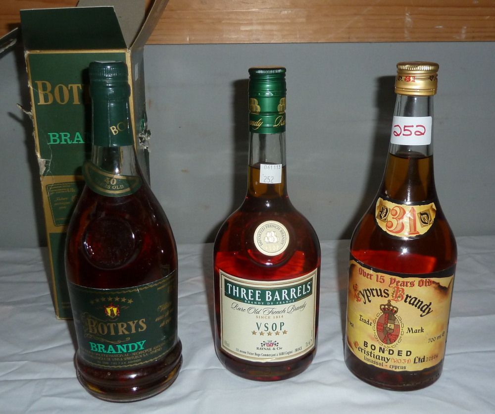 A bottle of Botrys brandy; a bottle of Cyprus brandy and a bottle of ...