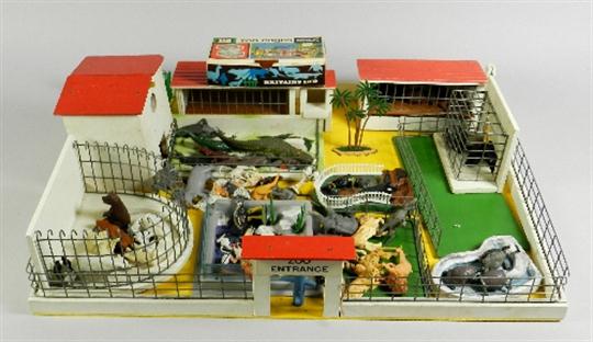 A Britains model Zoo, 60cm x 45cm deep, the model consists of a gated ...