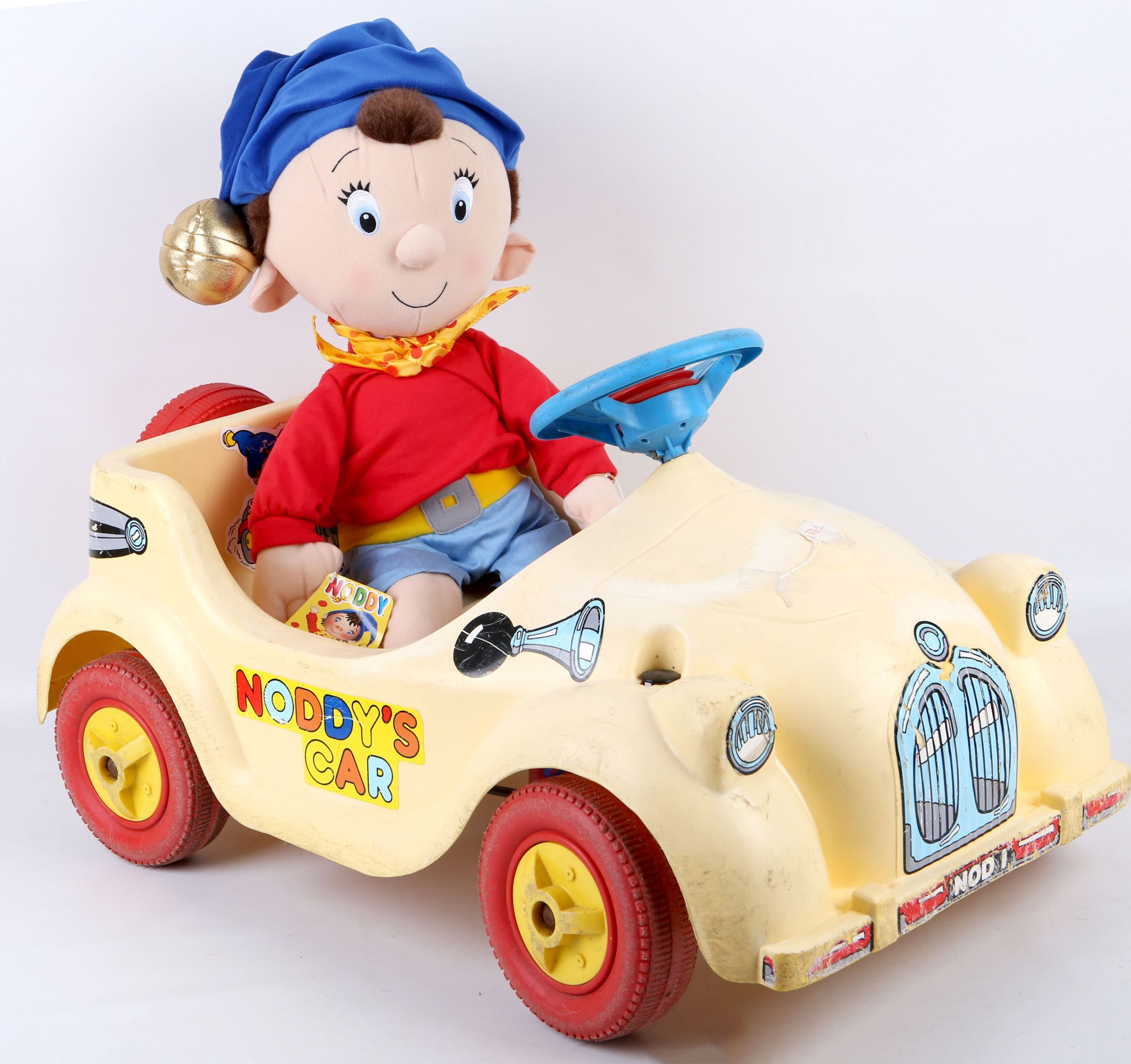 A vintage Noddy child`s pedal car with a Golden Bear fabric Noddy with ...