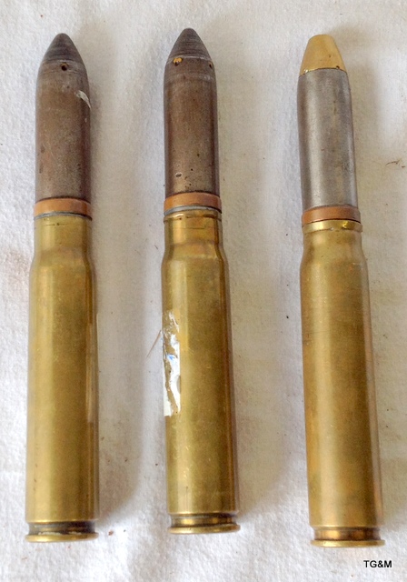 Three deactivated 1952 Hispano 20mm shells
