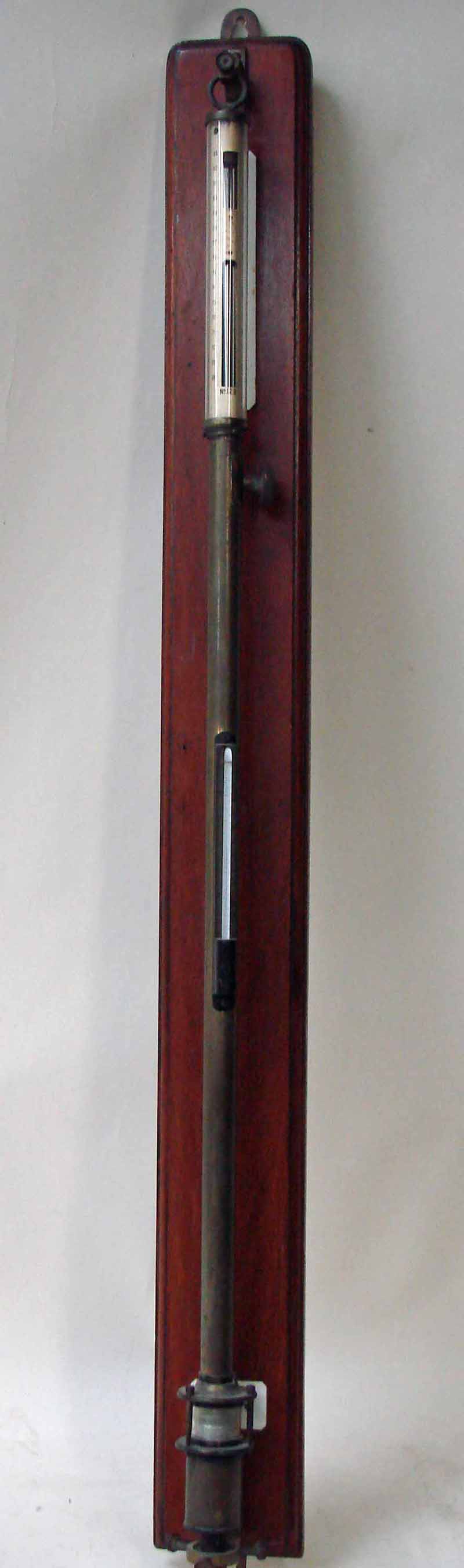 An early 20th century Marine stick barometer, Kew pattern, brass and ...