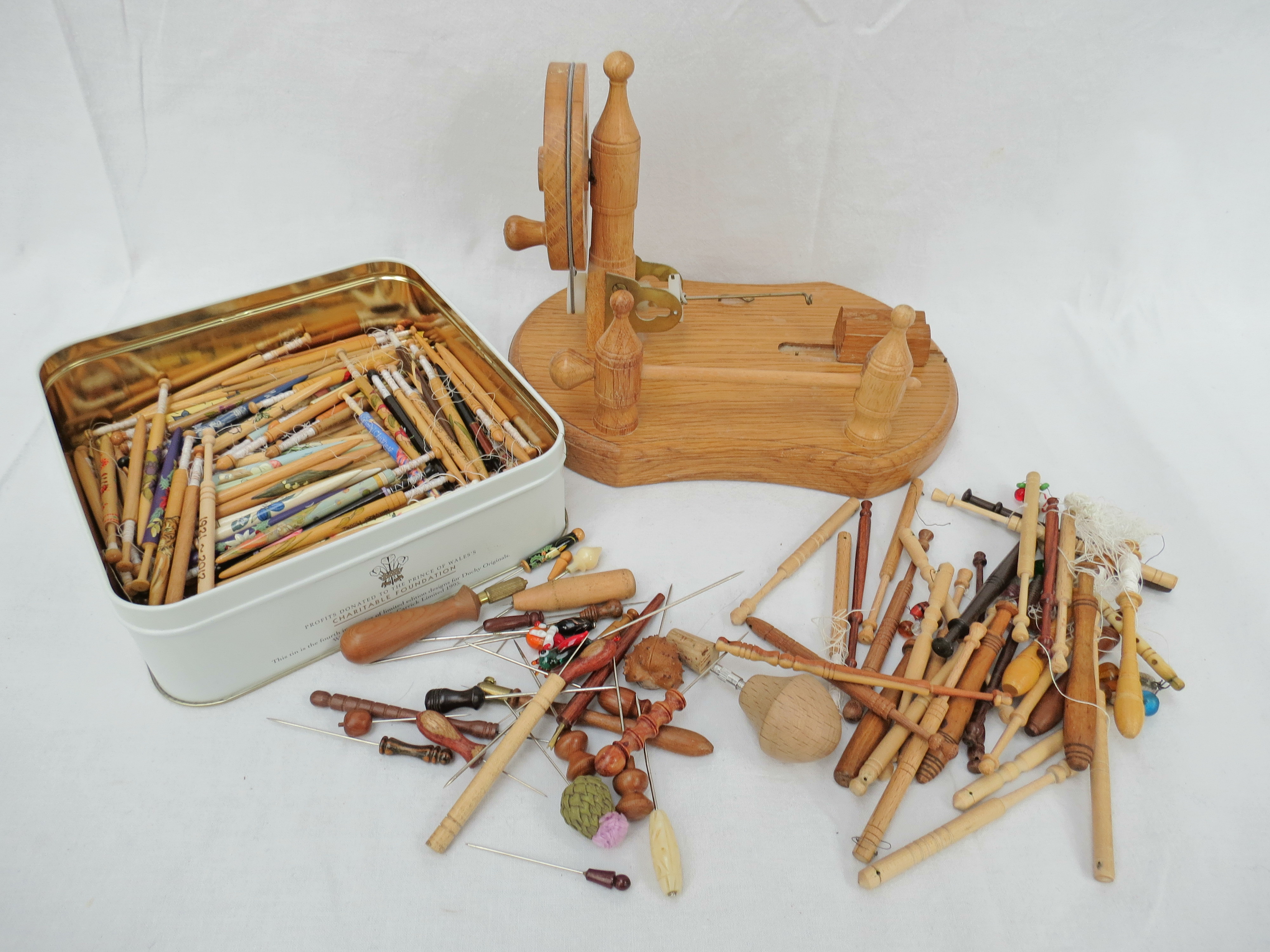 A quantity of lace making equipment including bobbin winder, bobbins ...