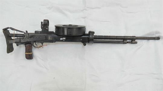 A deactivated, Degtyarev DT 7.62 calibre, light machine gun with pan ...