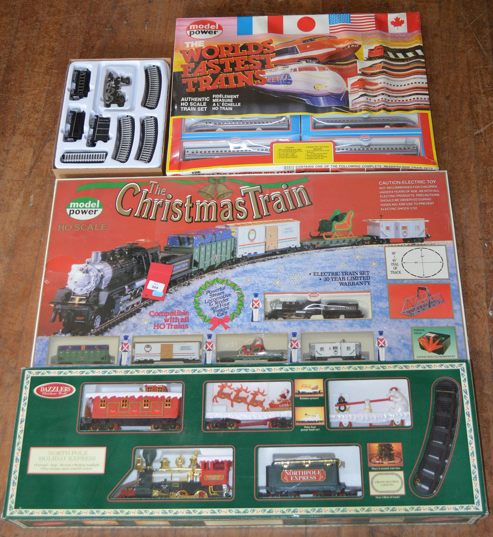 HO/other gauge, four train sets: consists of Model Power 1093 ...