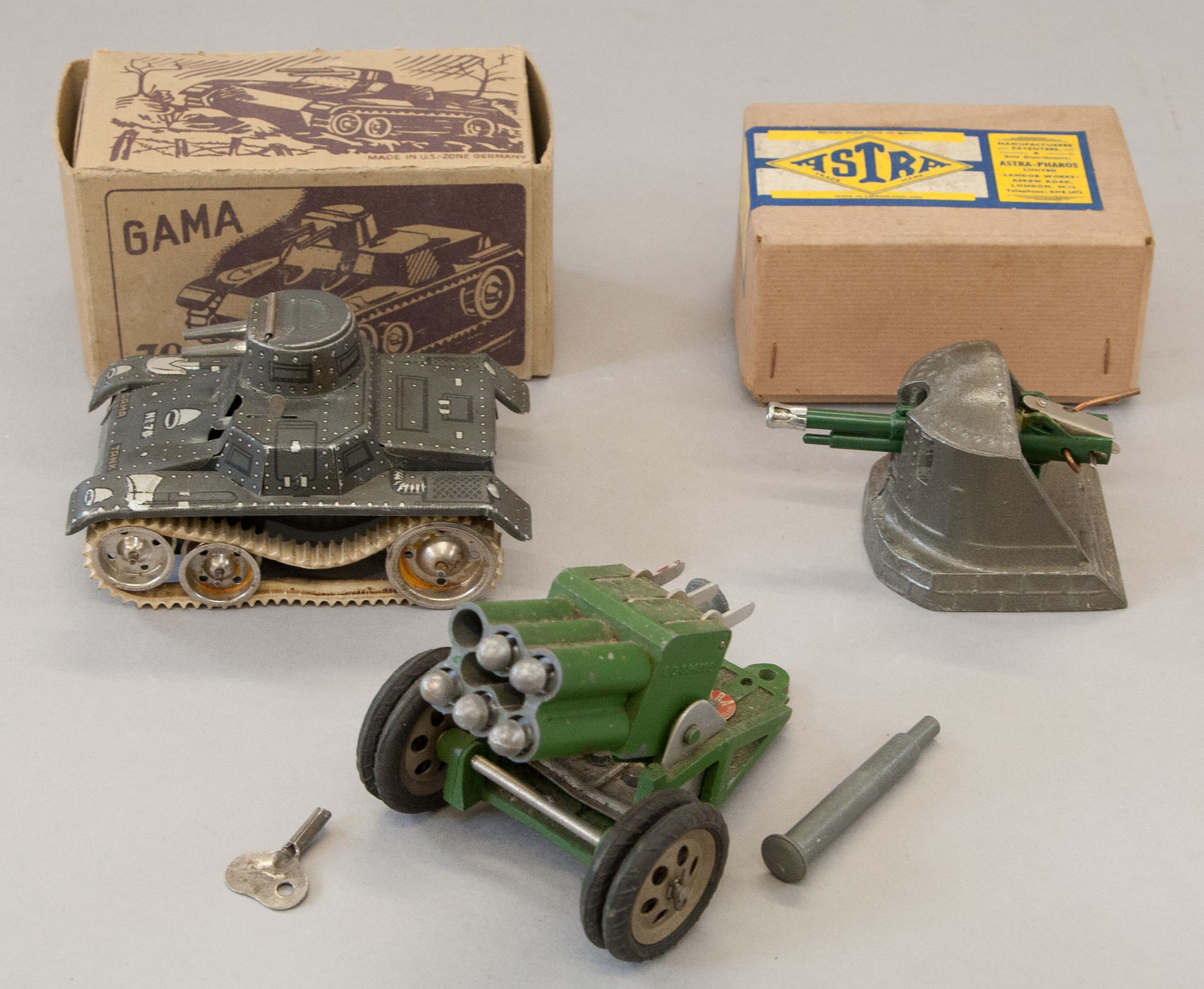 Three military toys: Astra Pharos Fort Gun, G+ in VG box; unboxed Astra ...