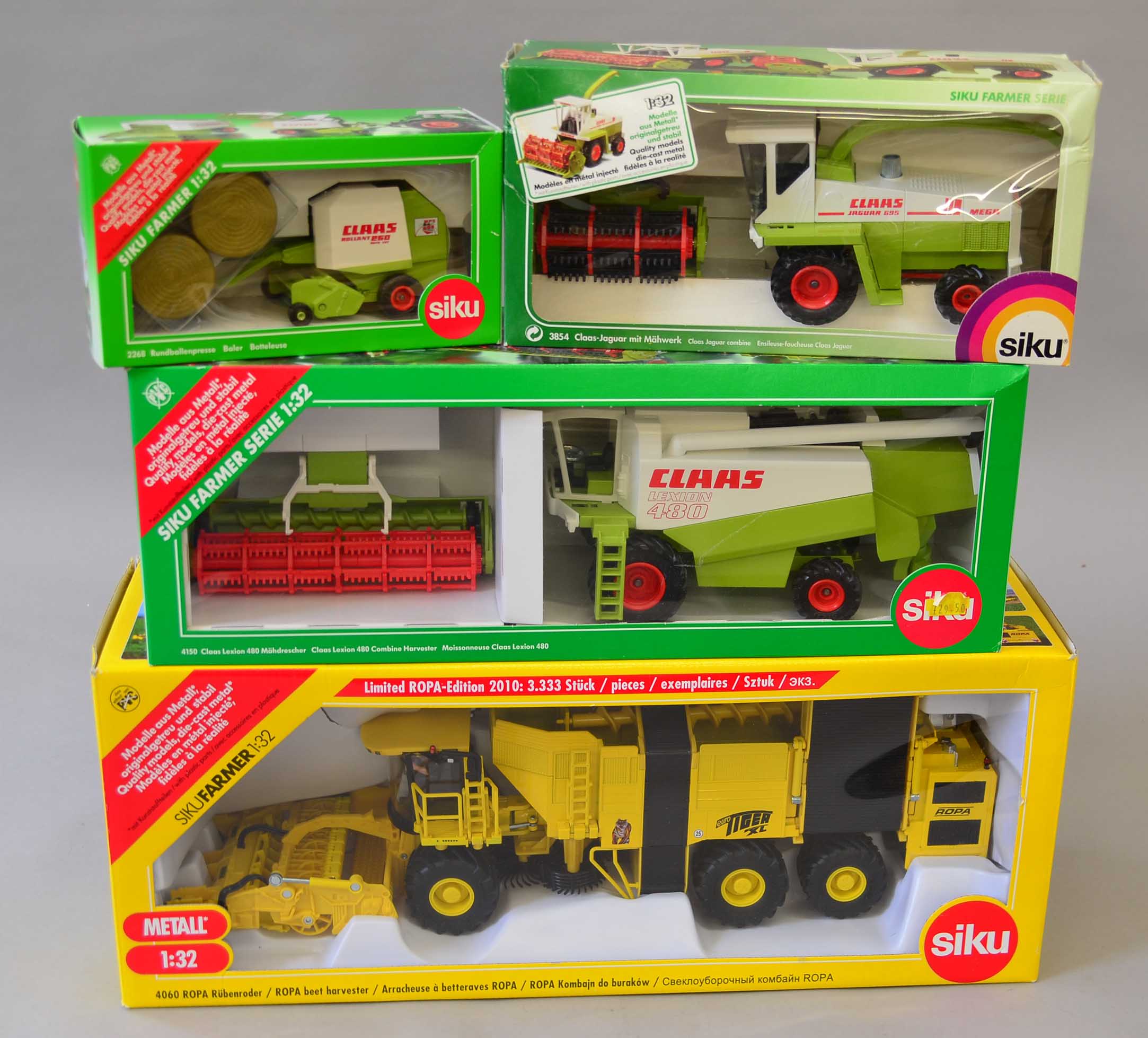 Four Siku Farmer 1:32 scale diecast agricultural models: 4060 ROPA Beet ...