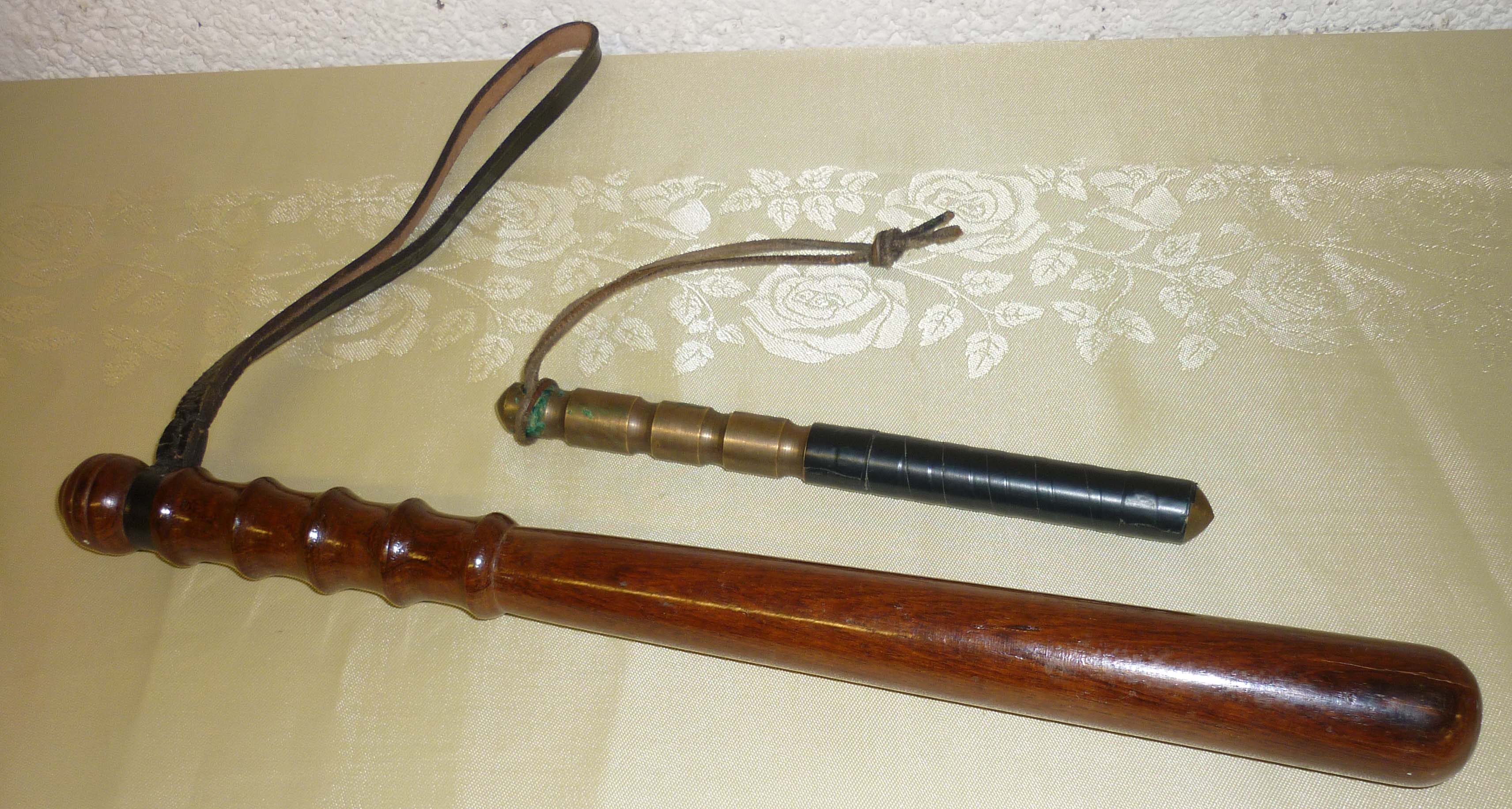 Wooden police truncheon and brass cosh