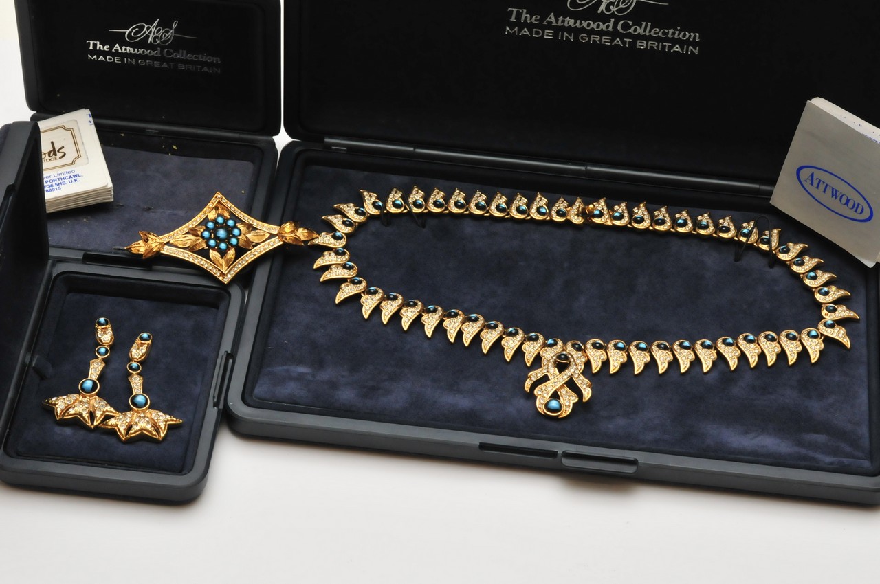 A collection of cased, The Attwood collection dress jewellery in fitted ...