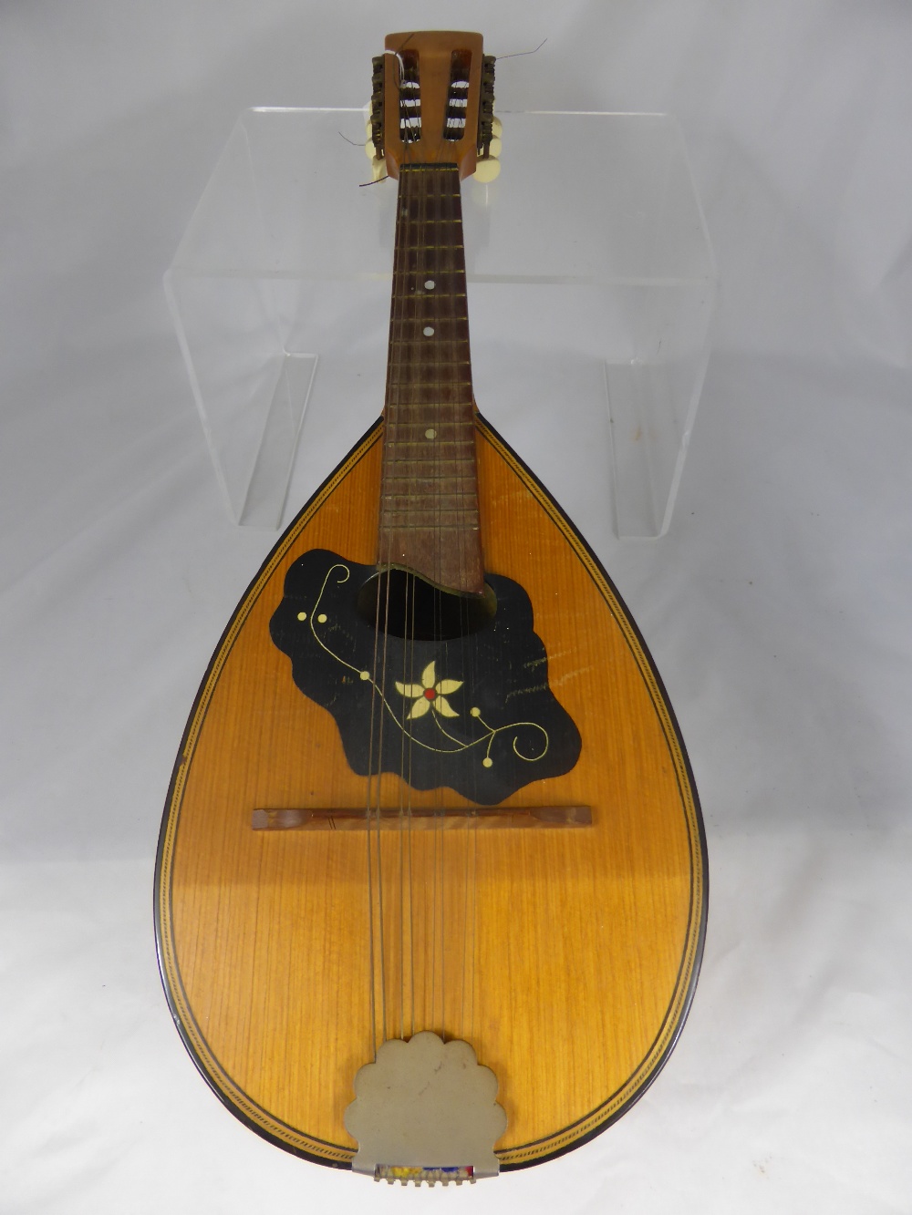 A Vintage Lignatone Czechoslavakia Round Back Mandolin with decorative ...