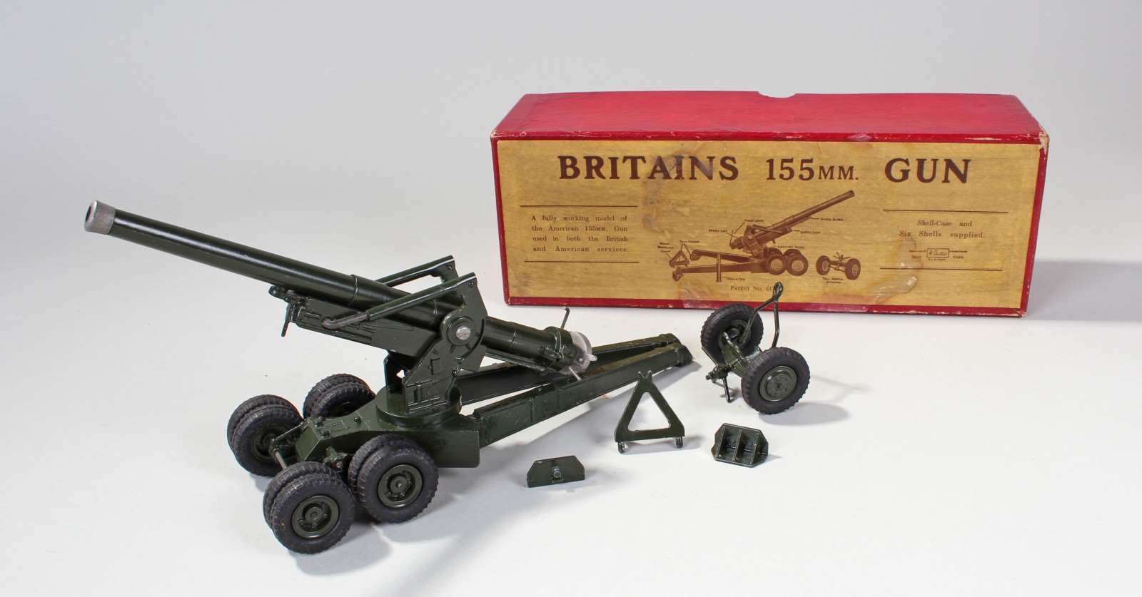 Britains 155mm field gun, No. 2064, with olive green body, contained in ...