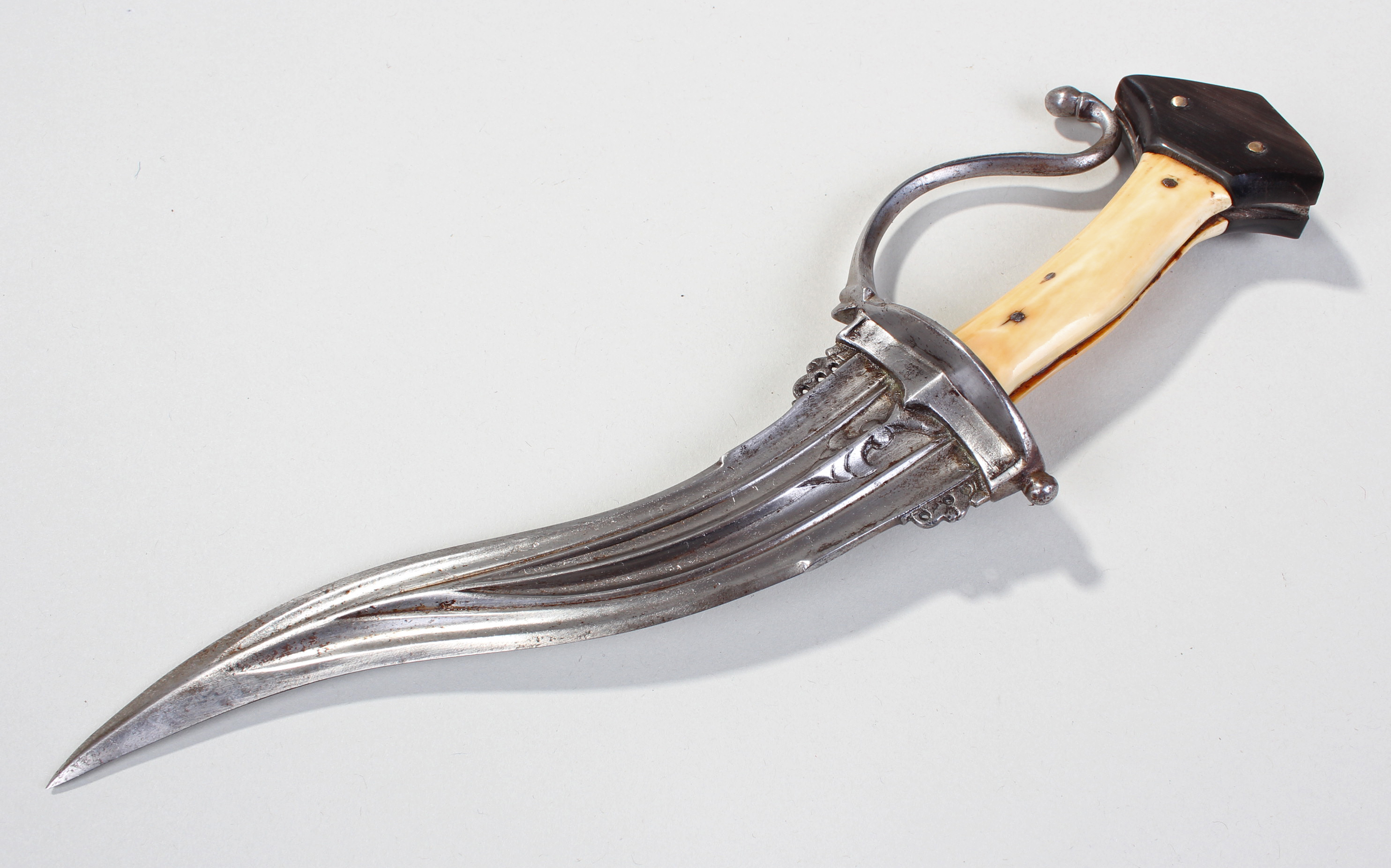 17th Century dagger, India, with marine ivory hilt, curved horn pommel ...