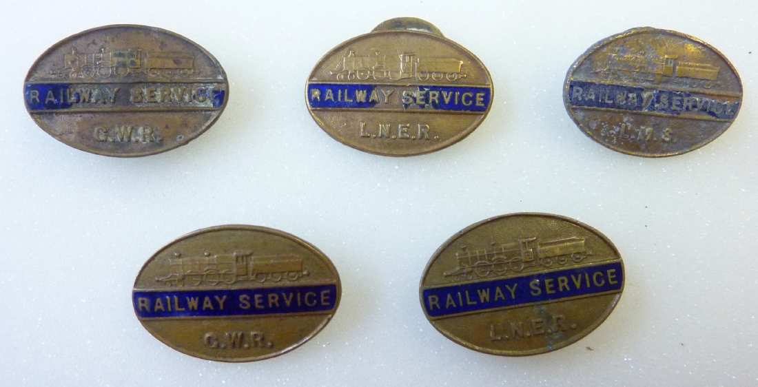 Five brass and enamel oval LNER, LMS & GWR railway service badges