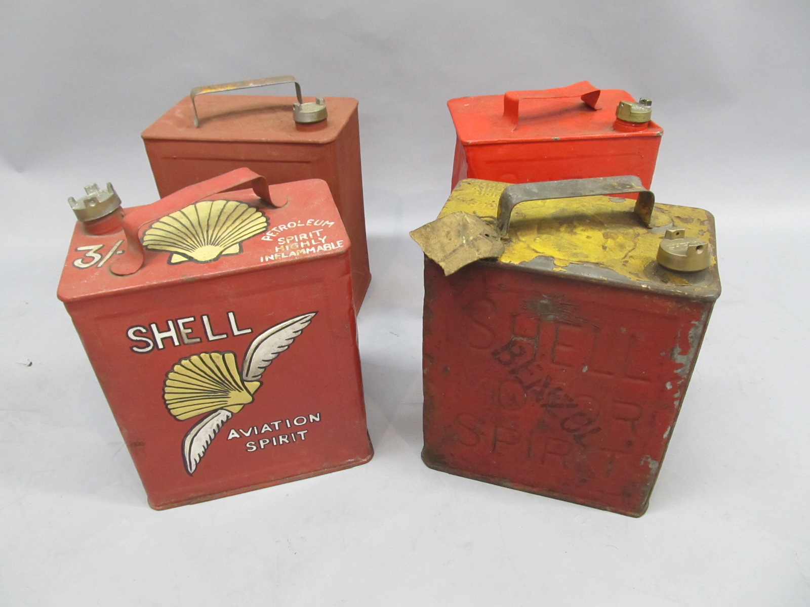 Four vintage two gallon petrol cans: Shell Aviation Spirit, two Shell ...