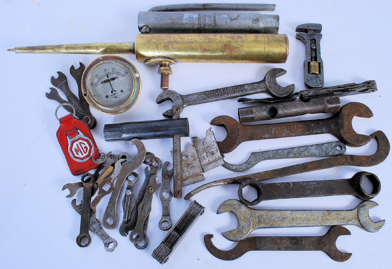 A collection of vintage motorcycle tools to include Triumph spanners ...