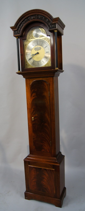 A longcase clock by Smallcombe, England, with brass dial bearing the ...
