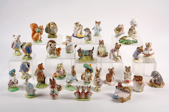 COLLECTION OF (32) BEATRIX POTTER PORCELAIN FIGURINES by ROYAL DOULTON ...
