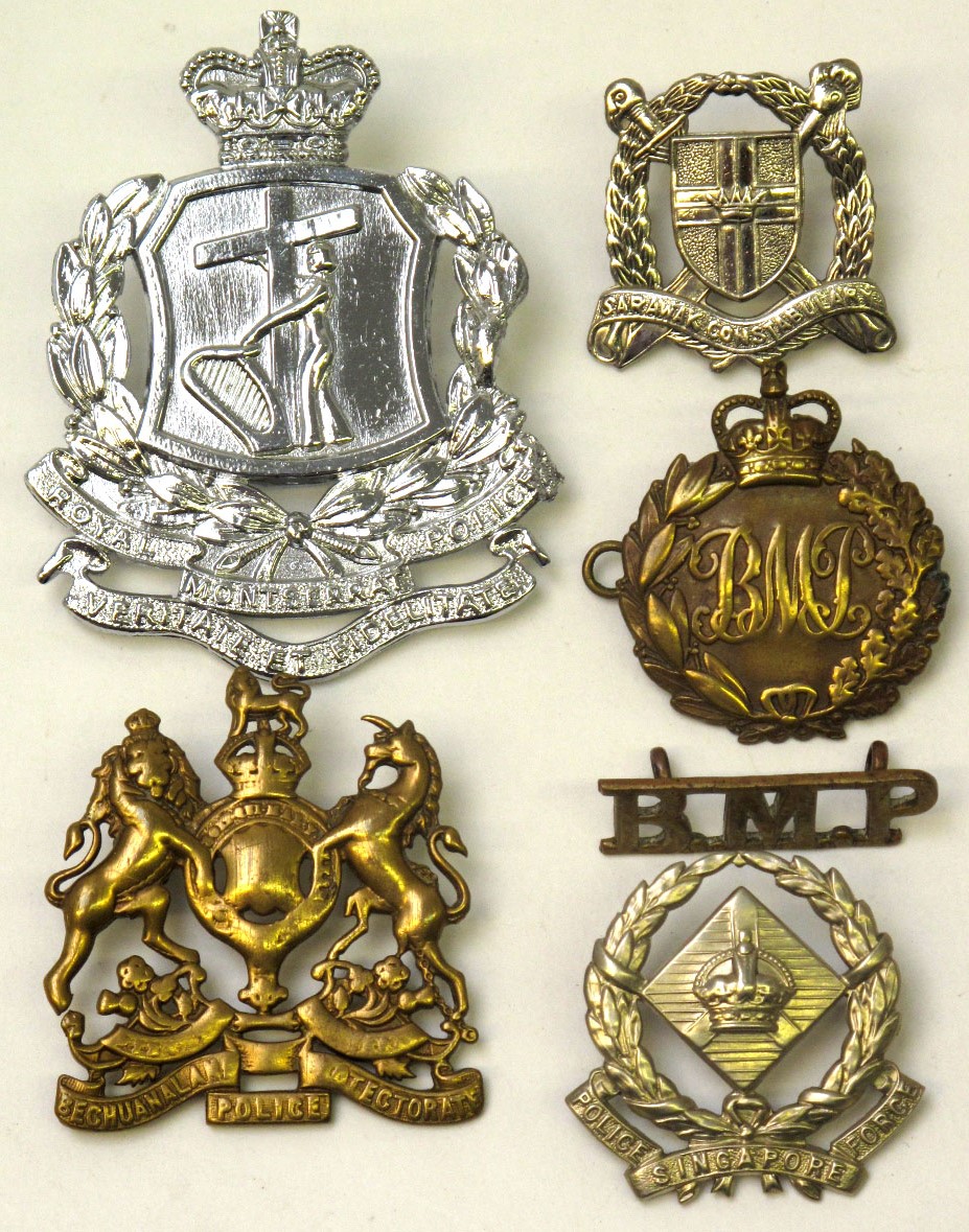 Various Colonial Police Badges consisting of George VI brass cap badge ...