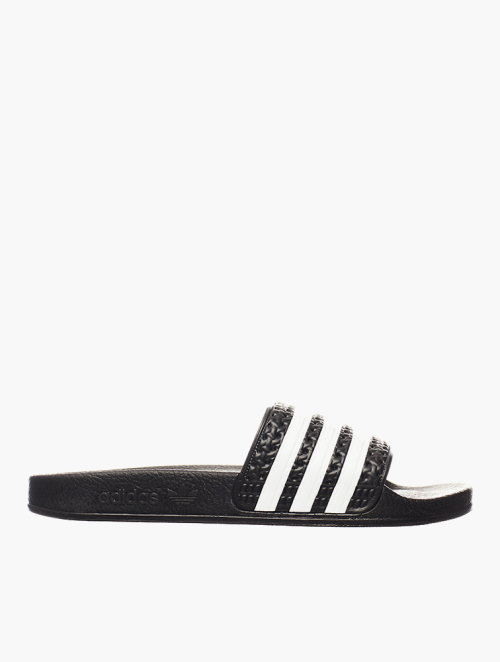 MyRunway | Shop adidas Black & White Adilette Slides for Men from ...