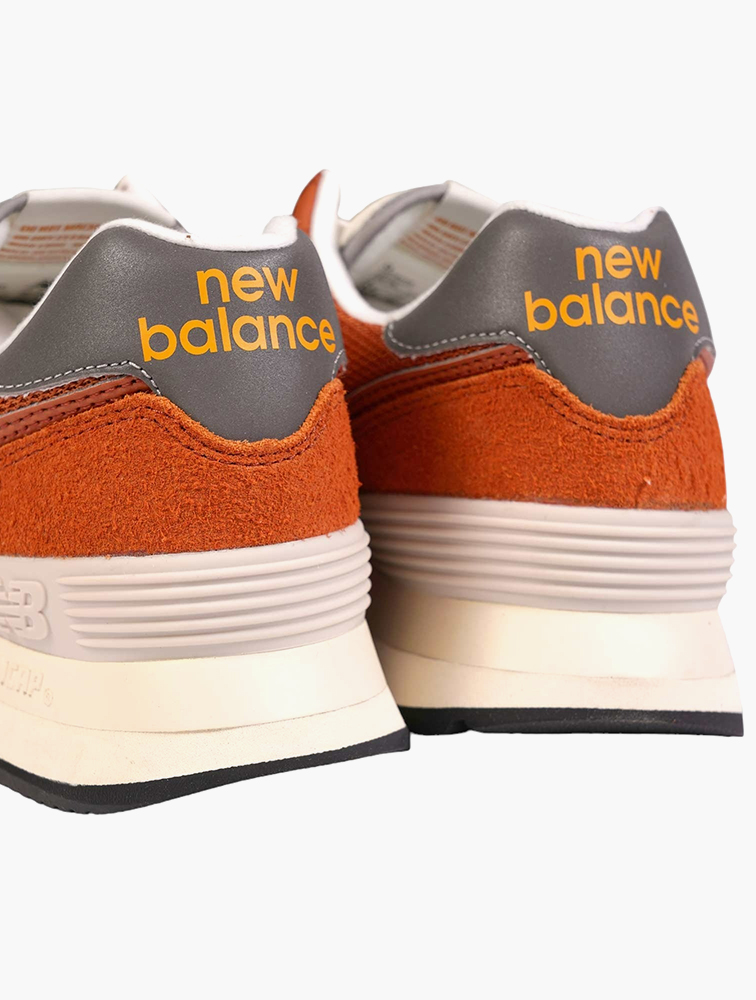 MyRunway | Shop New Balance Orange Burst 574 Lace Up Sneakers for Women ...