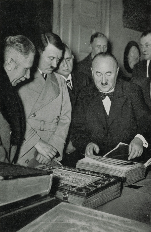 Adolf Hitler viewing the treasures of the Bavarian state library ...